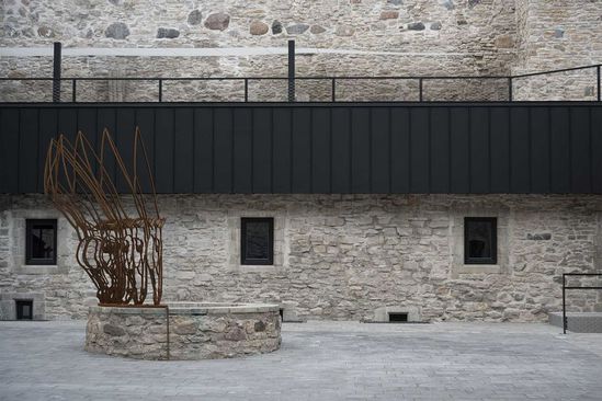 Titanium zinc cladding enhances castle entrance pavilion | RHEINZINK ...