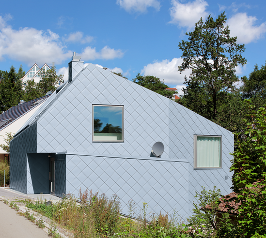 Zinc square tile cladding gives home diamond effect | RHEINZINK | ESI ...