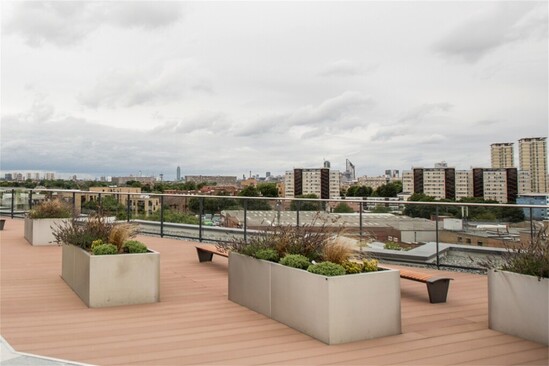 Planters and seating for residential rooftop garden | Street Design ...
