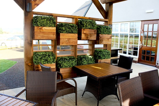 Bespoke buxus hedge boxes for external seating area | Livingreen Design ...