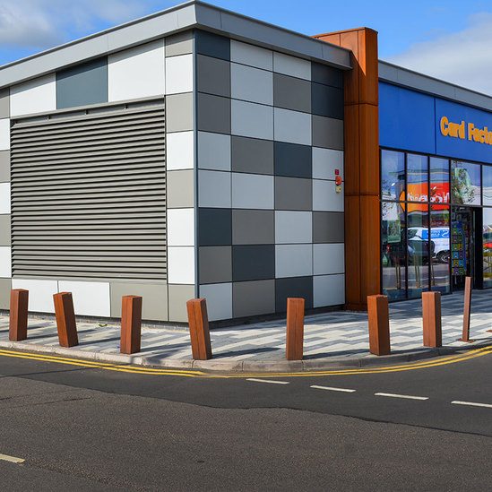 Corten steel bollards and cycle stands for retail park | Artform Urban ...