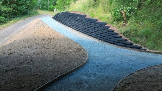 Rootlok system for vegetated retaining wall on footway | GeoGrow | ESI ...