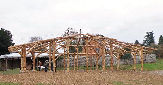 16m-diameter bespoke timber roundhouse with sedum roof | Roundwood ...