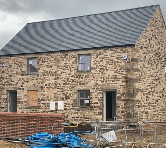 Harwood Rubble stone cladding - residential development | Dunhouse ...