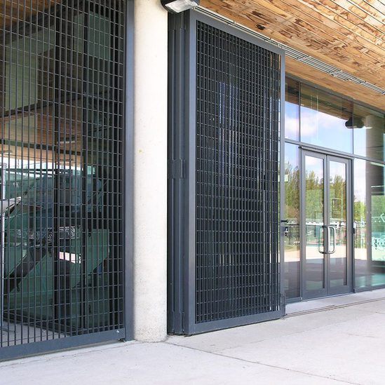 Bi-folding steel security entrance gates | Lang+Fulton | ESI External Works