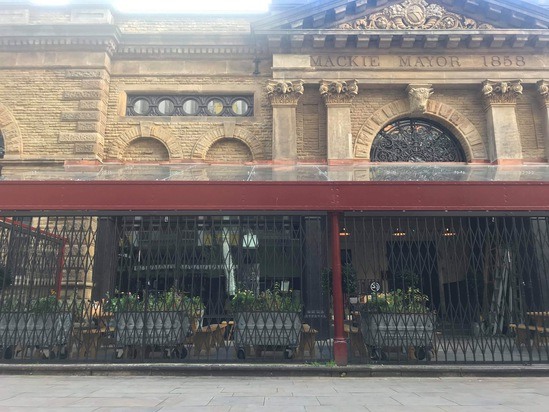 Collapsible gates secure Mackie Mayor, Manchester | Bolton Gate Company ...