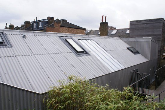 Corrugated sheeting outer skin transforms The Old Yard | Cembrit | ESI ...