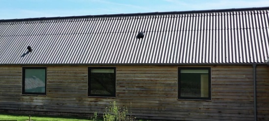 Corrugated roof gives barn conversion a traditional look | Cembrit ...
