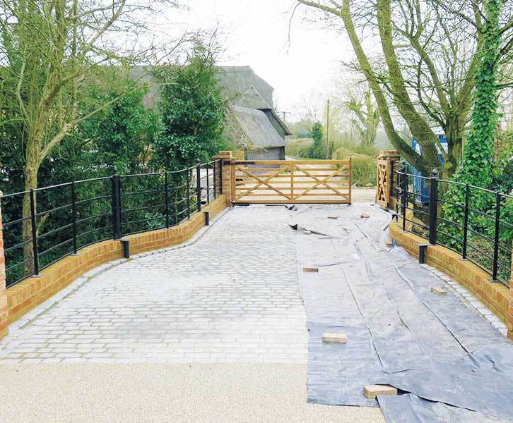 Bespoke 5-bar estate fencing for historic bridge | Paddock Fencing ...
