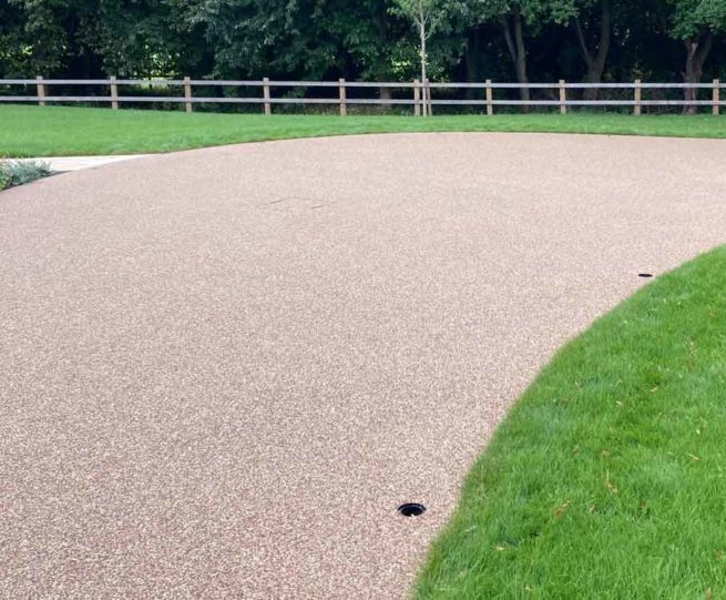 Porous resin bound surfacing for sloping driveway | Addagrip Terraco ...