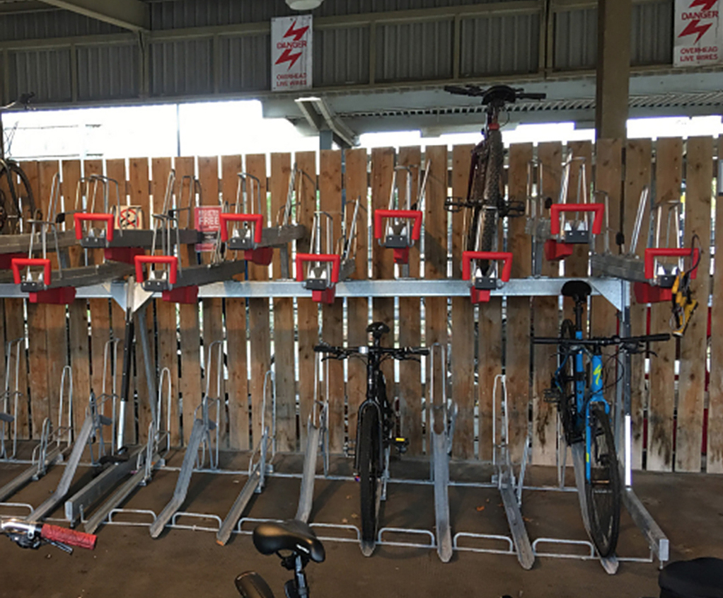 CapaCITY two-tier bike rack with gas-assisted lifting | Cyclepods | ESI ...