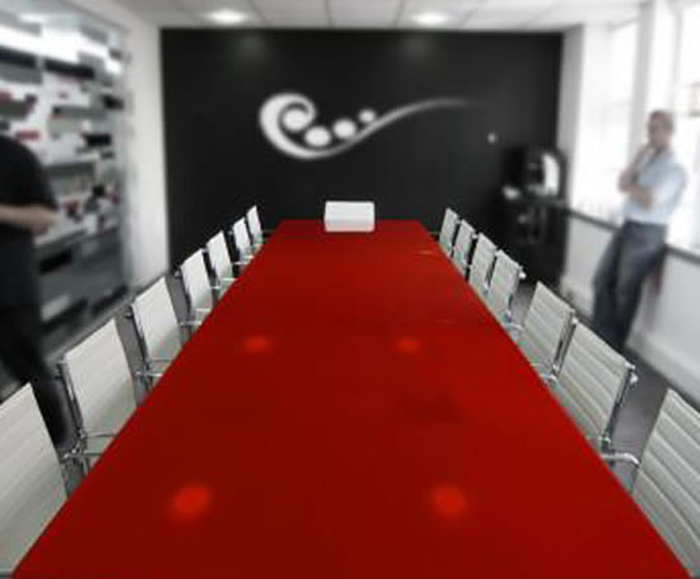 Red glass boardroom table | GMT Interiors | ESI Interior Design