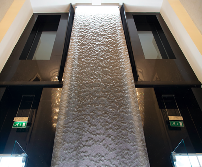 7m-tall AquaVeil® illuminated water wall for foyer | Tills Innovations ...