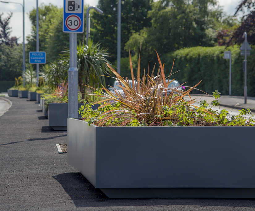 Bespoke powder-coated steel planters for highway scheme | IOTA | ESI ...