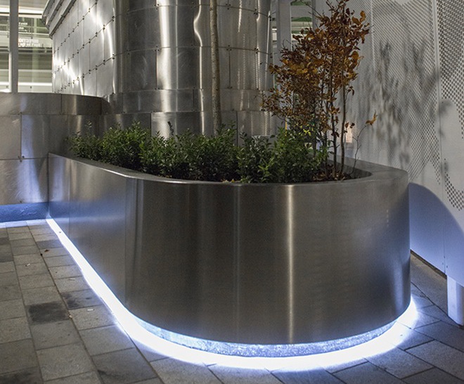 Bespoke stainless steel tree planters, college hospital | IOTA | ESI ...