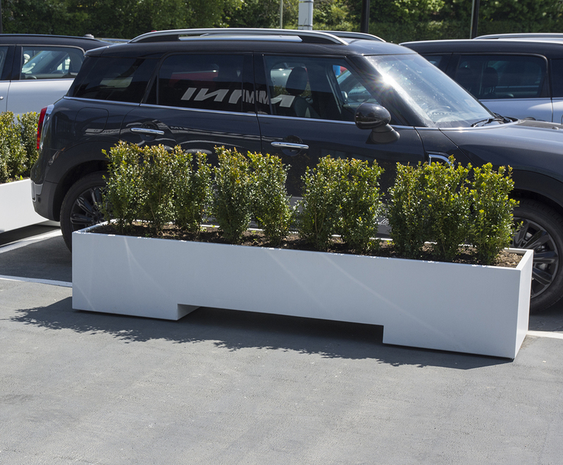 Bespoke movable steel planters for new car dealership | IOTA | ESI ...
