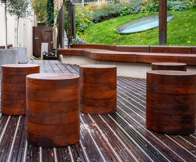 Bespoke curved timber seating for courtyard garden | IOTA | ESI ...