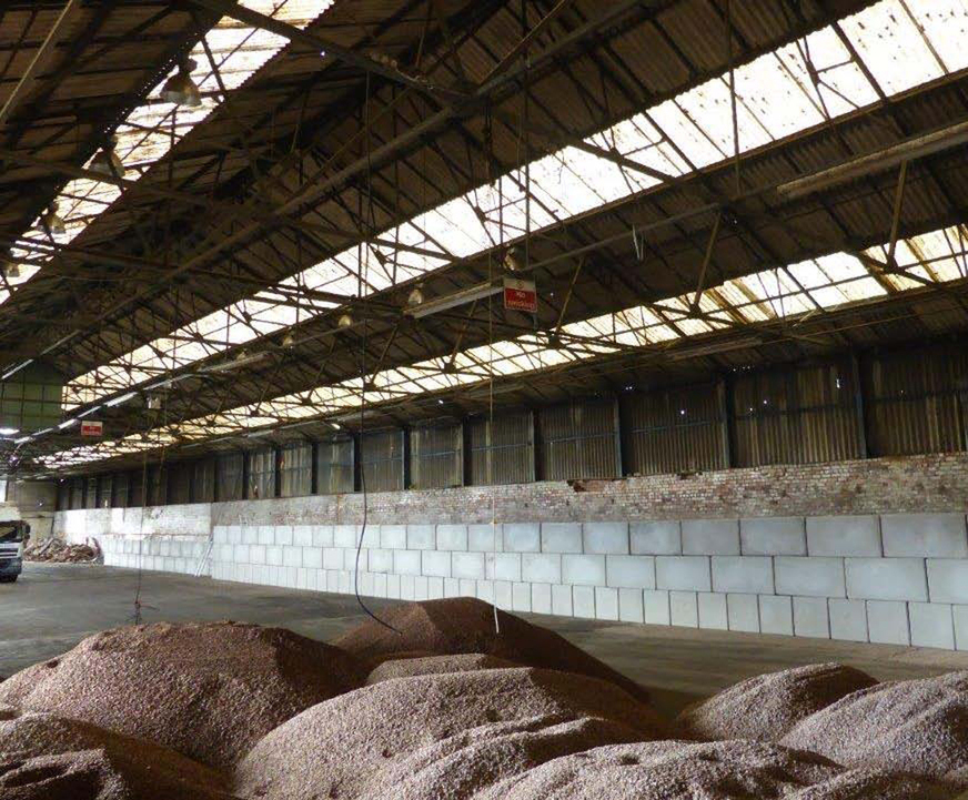 Concrete retaining wall for derelict warehouse | Elite Precast Concrete ...