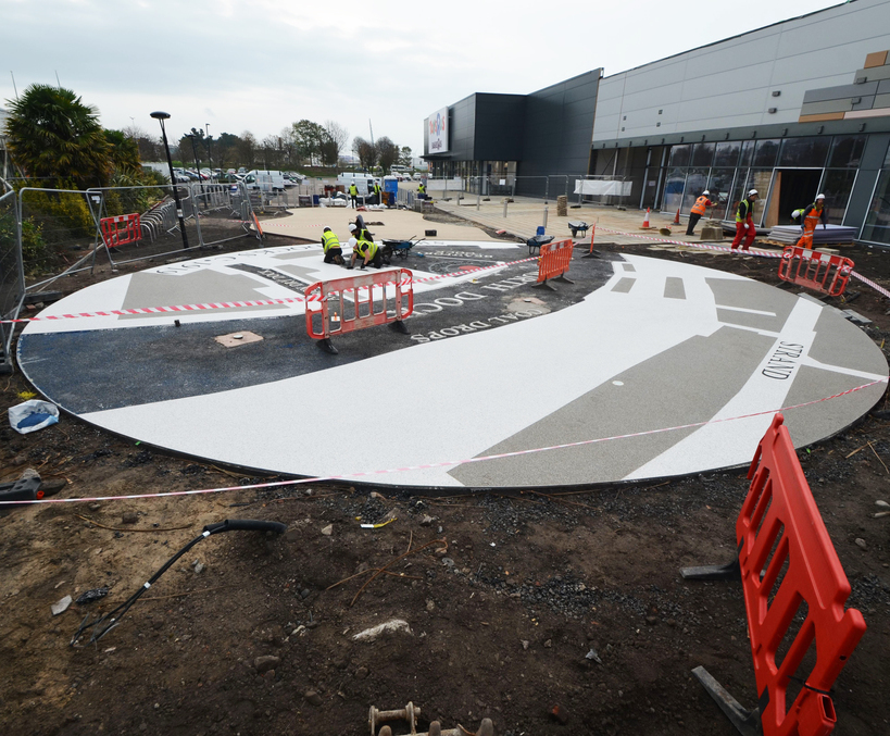 Resin bound wayfinding graphic with historical message | Clearstone ...