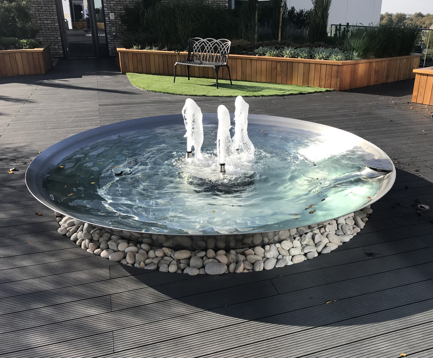 Stainless steel water feature with jets - Chelsea Island | Fountains ...