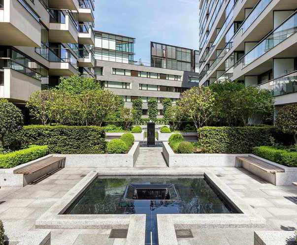 Illuminated table-top clock fountain - One Tower Bridge | Fountains ...