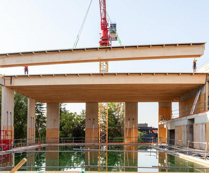 Kerto LVL roof beams for indoor swimming pool | Metsä Wood UK | ESI ...