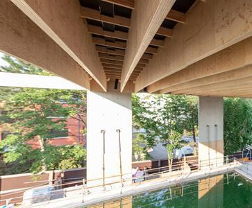 Kerto LVL roof beams for indoor swimming pool | Metsä Wood UK | ESI ...