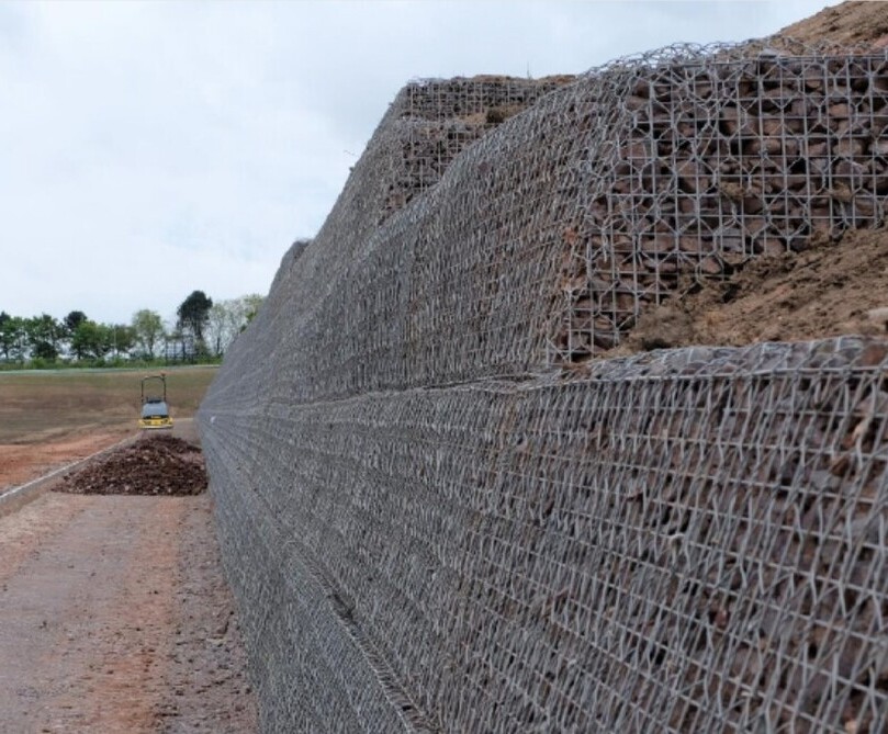 Award-winning reinforced soil bund for business park | Maccaferri | ESI ...