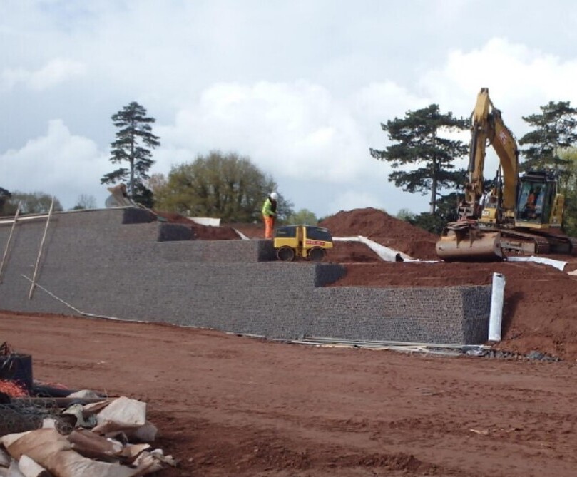 Award-winning reinforced soil bund for business park | Maccaferri | ESI ...