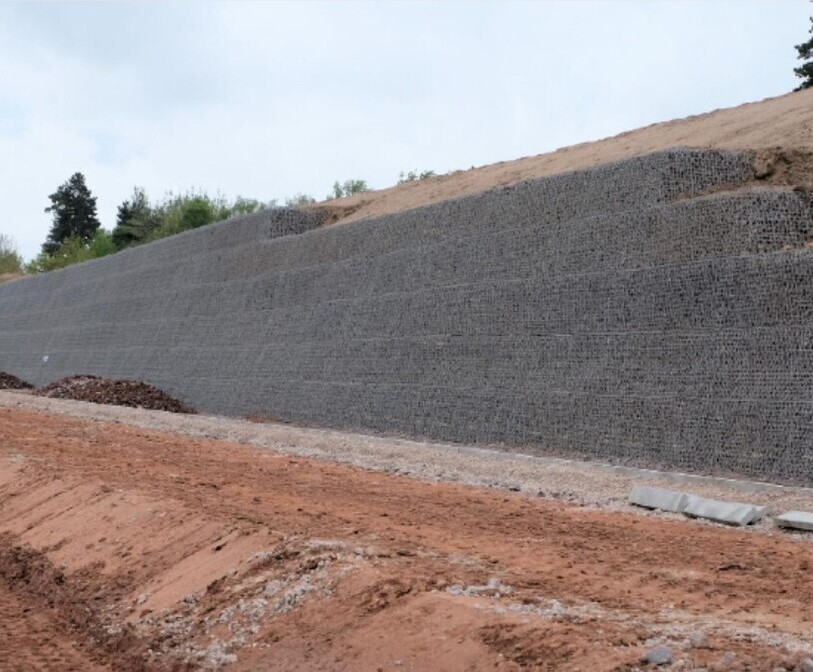 Award-winning reinforced soil bund for business park | Maccaferri | ESI ...