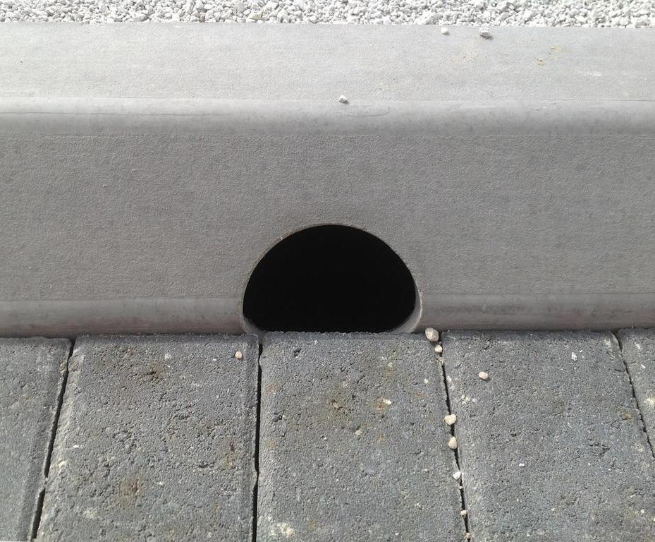 Combined kerb and drainage improves busy A road | Marshalls | ESI ...