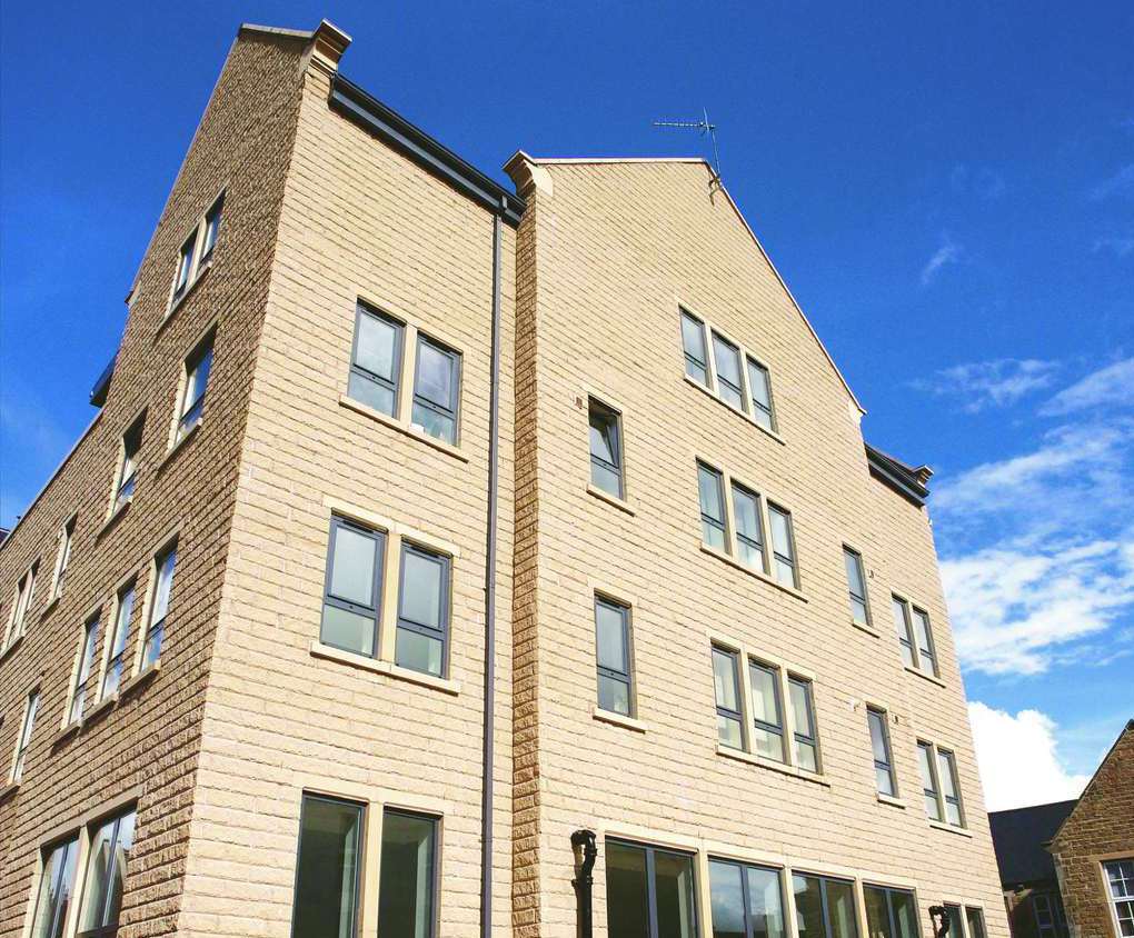 Reconstructed stone walling for heritage development | Marshalls | ESI ...