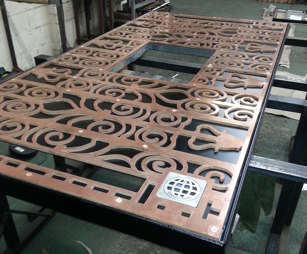 Bespoke decorative bronze tree grilles, NOMA development ...