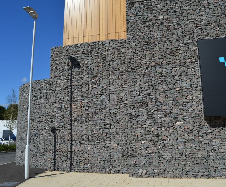 Gabion retaining walls and cladding for retail park | Phi Group | ESI ...