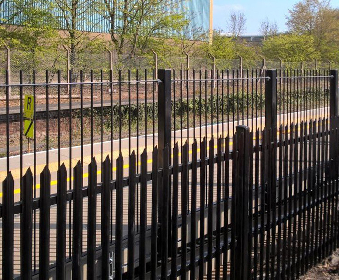 PAS68 steel palisade fencing for railway station HMV | Barkers Fencing ...