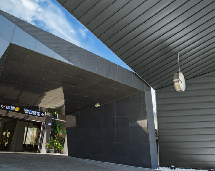 Zinc tiles and seamed cladding for railway station | RHEINZINK | ESI ...