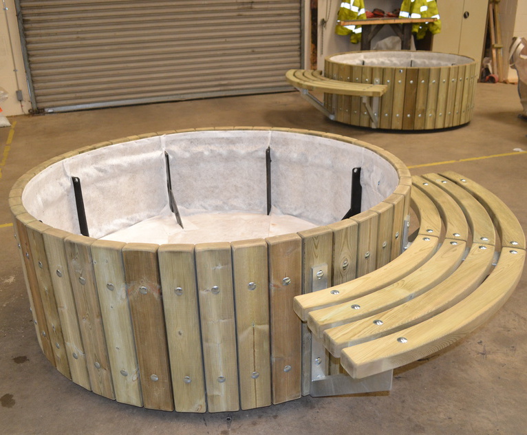 Swithland circular FSC timber tree planters | Street Design | ESI ...