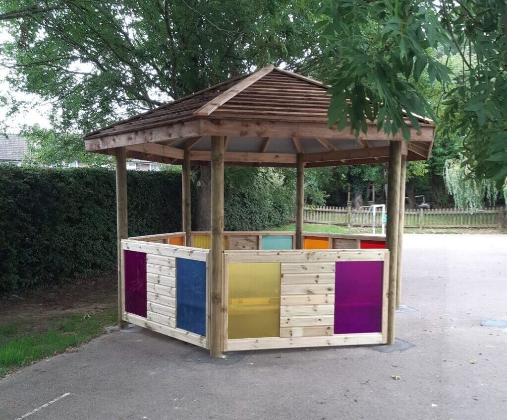 Vibrant outdoor classroom and seating area for school | Setter Shelters ...