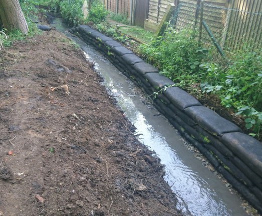 Rootlok vegetated wall for watercourse flood defence | GeoGrow | ESI ...