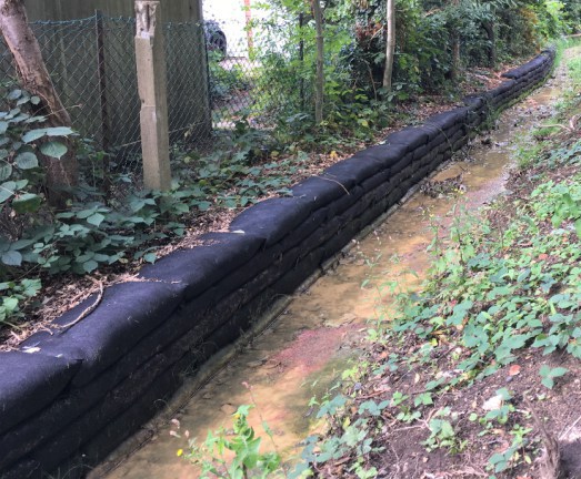 Rootlok vegetated wall for watercourse flood defence | GeoGrow | ESI ...