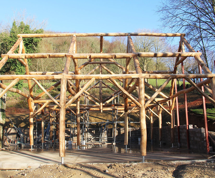 Bespoke roundwood T-shaped barn for weddings and events | Roundwood ...