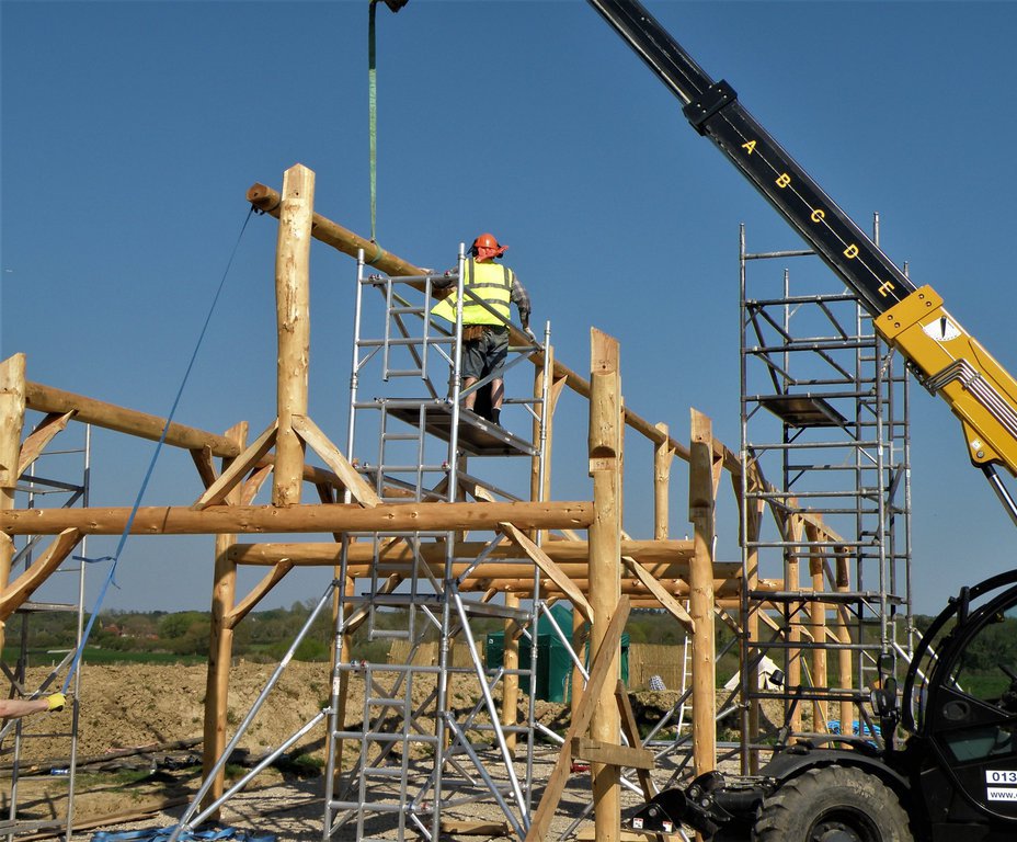 Bespoke roundwood T-shaped barn for weddings and events | Roundwood ...