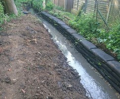 Rootlok system for vegetated retaining wall on footway | GeoGrow | ESI ...